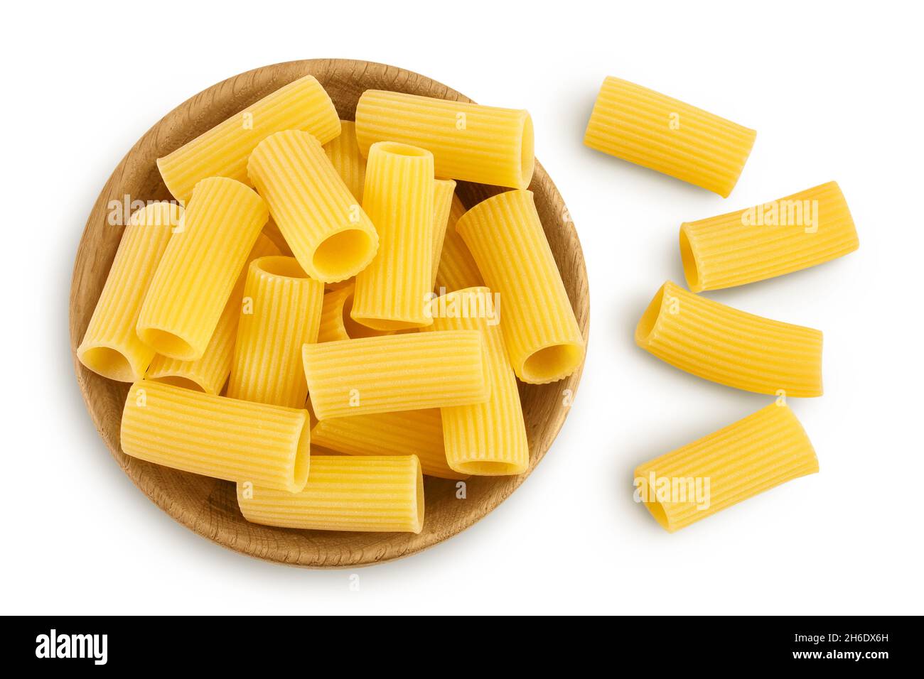 raw italian Rigatoni pasta in wooden bowl isolated on white background ...