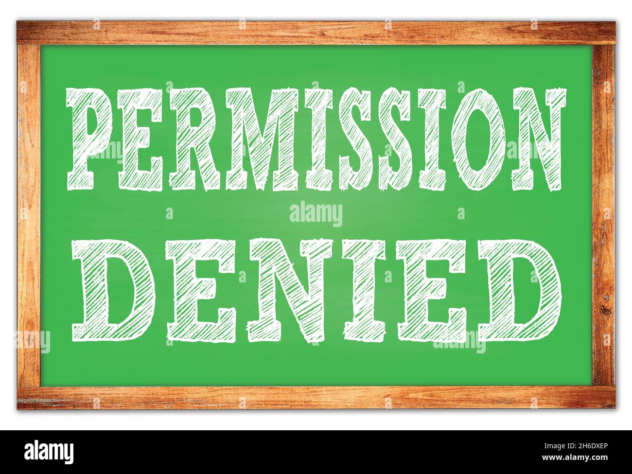 PERMISSION DENIED written on green wooden frame school blackboard Stock ...