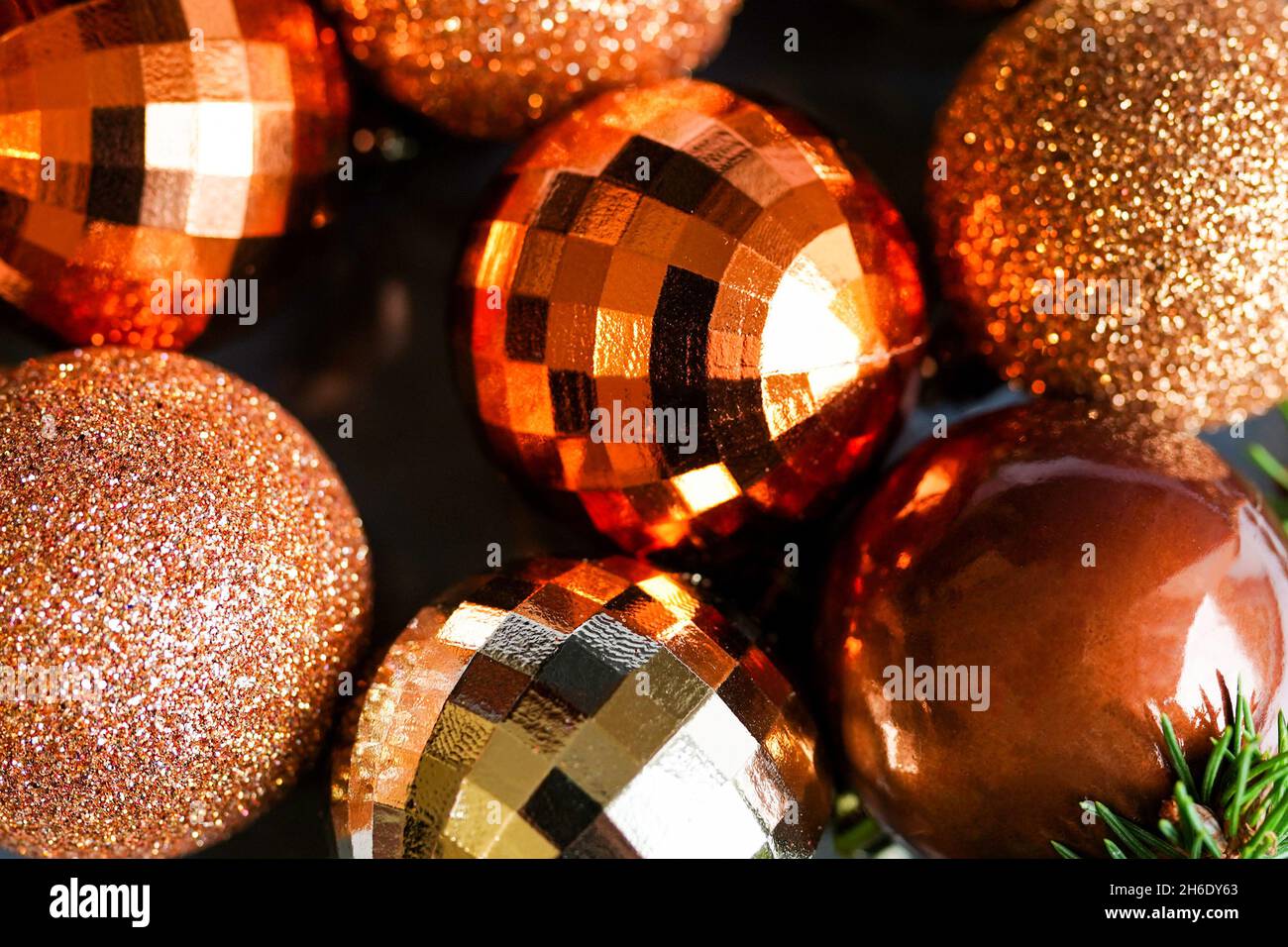 Christmas shiny golden and brown balls background Stock Photo - Alamy