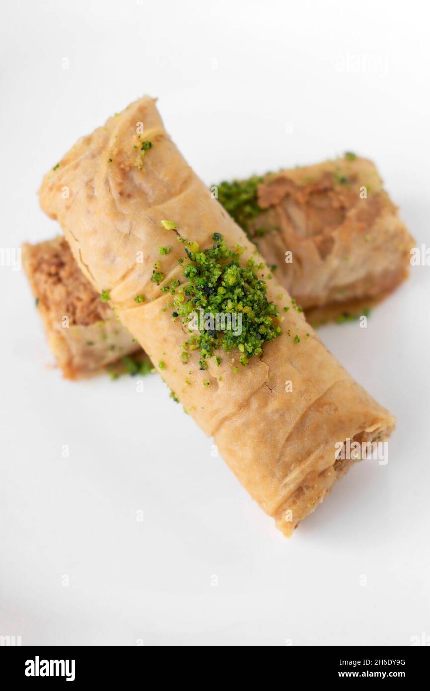 Fresh homemade Baklava roll with pistachio middle eastern sweet dessert ...