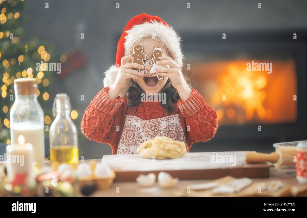 Merry Christmas and Happy Holidays. Family preparation holiday food ...