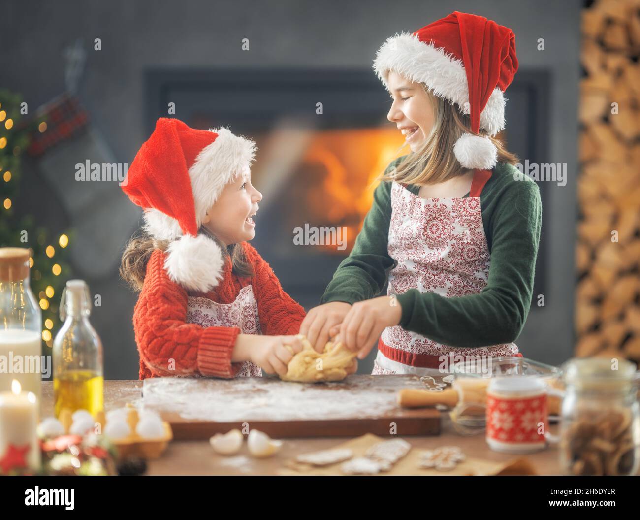 Merry Christmas and Happy Holidays. Family preparation holiday food ...