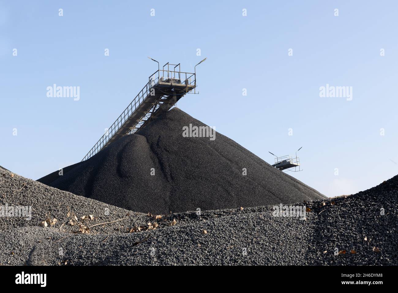 View of open-pit mining machines with sifters and conveyor belts in ...