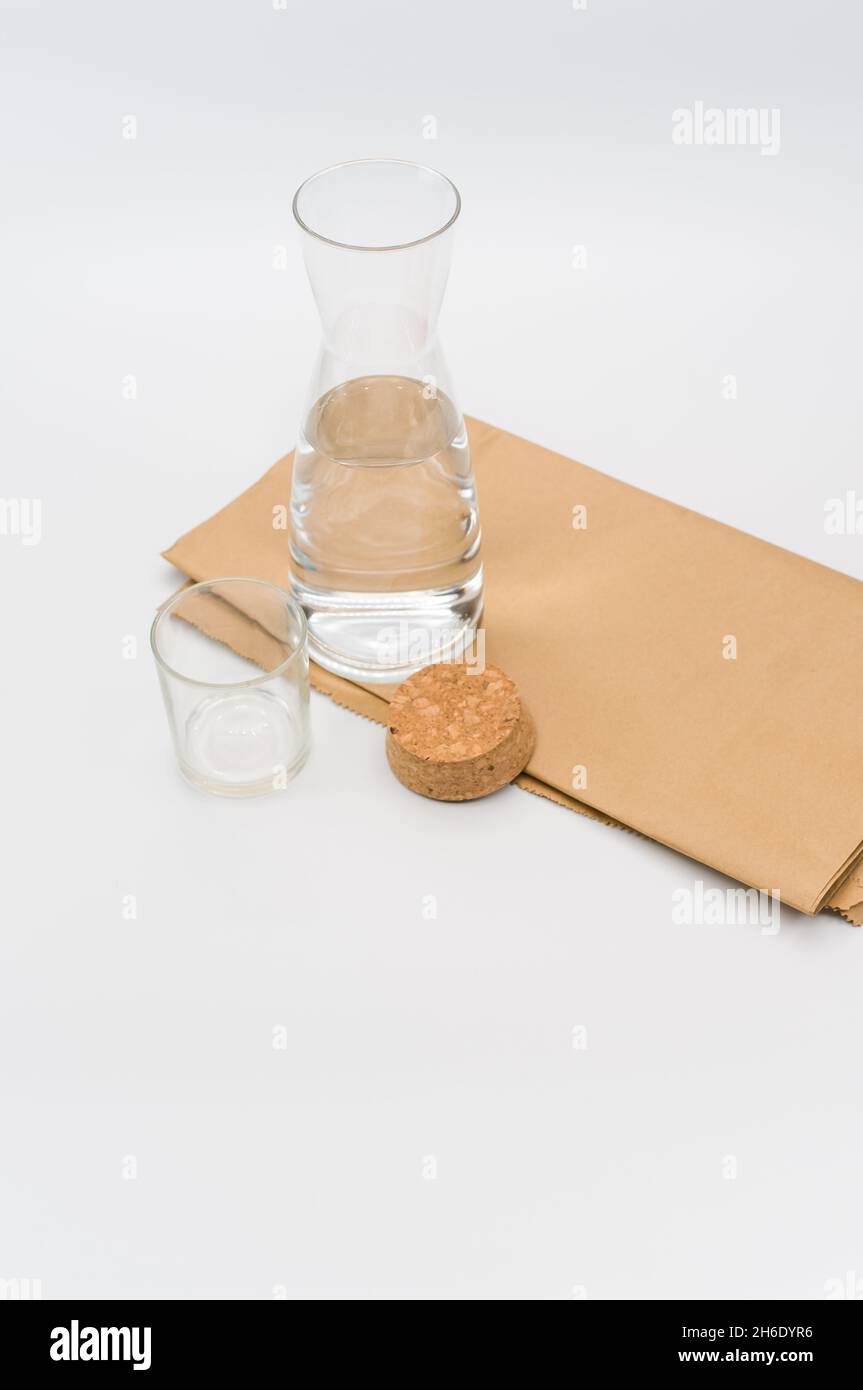 glass carafe with fresh water and cork lid on a white background Stock ...