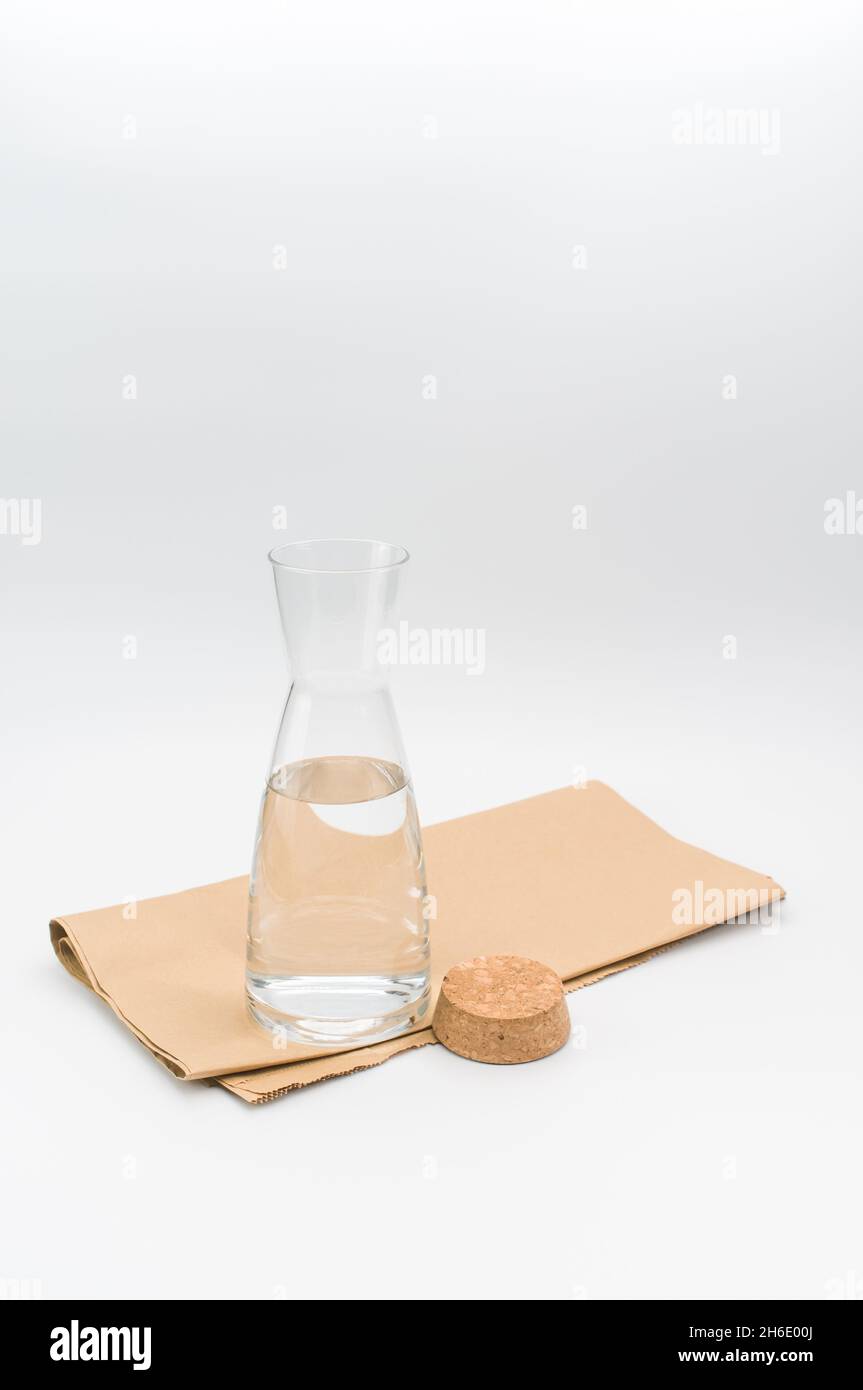 glass carafe with fresh water and cork lid on a white background Stock ...