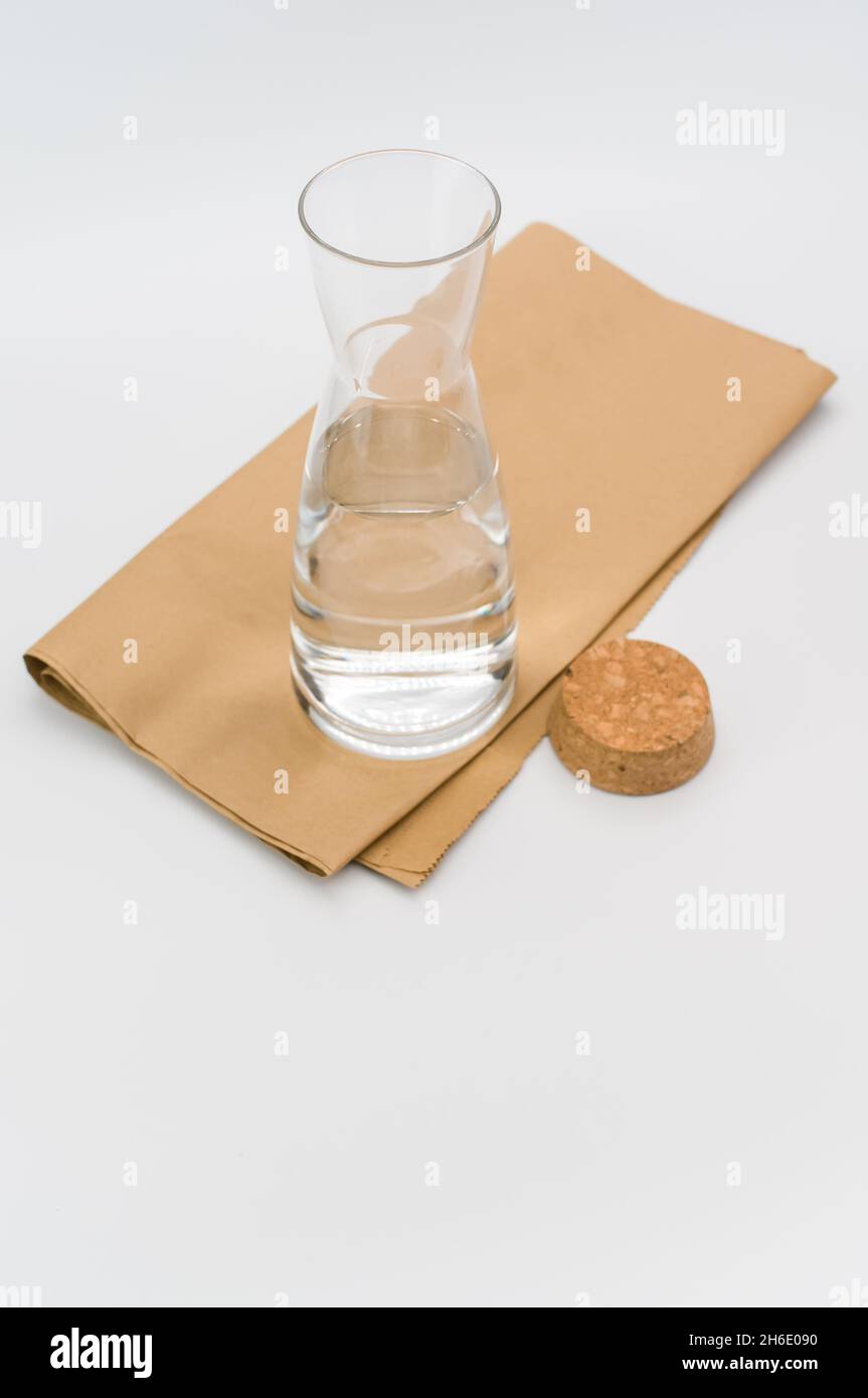 glass carafe with fresh water and cork lid on a white background Stock ...