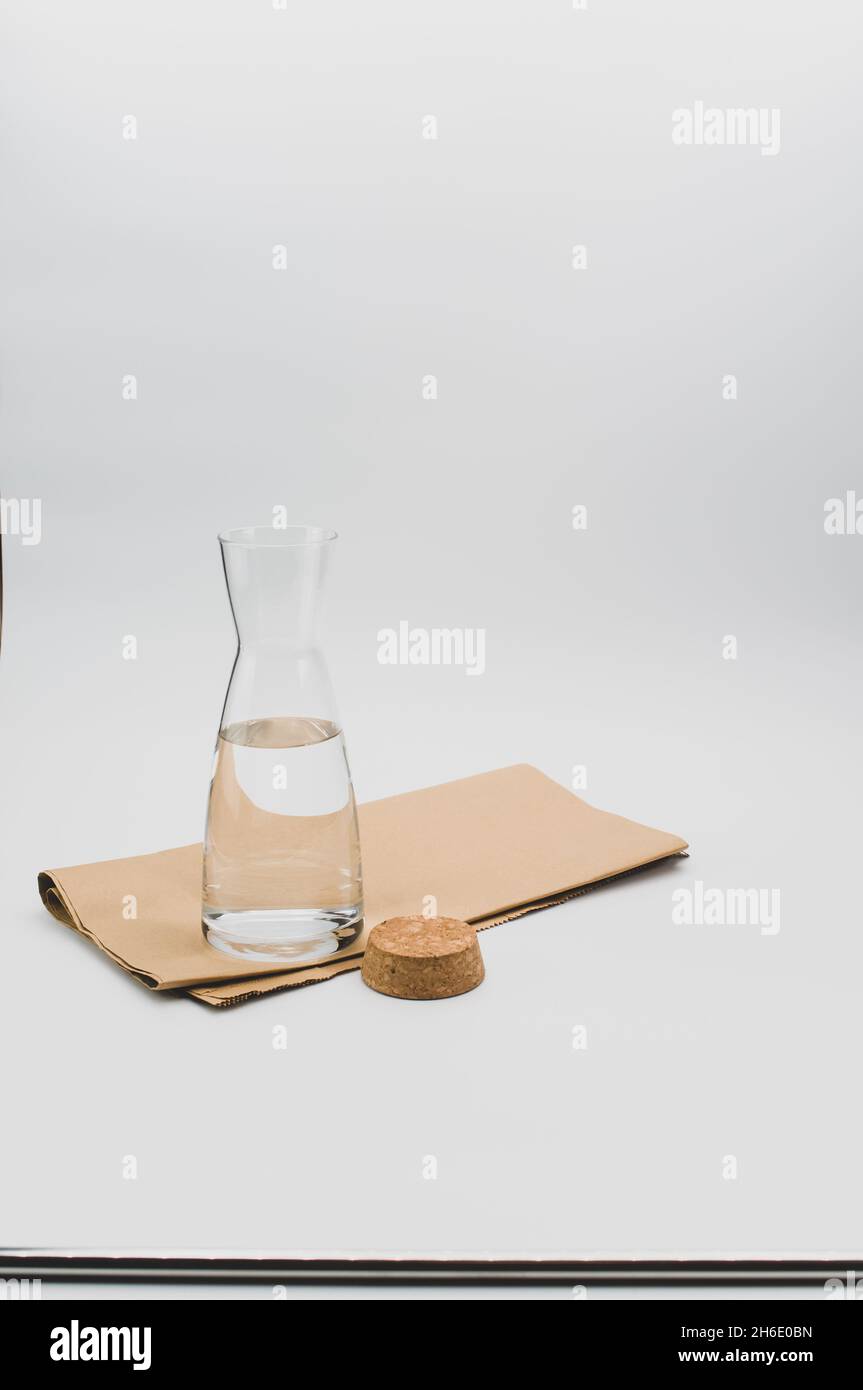 glass carafe with fresh water and cork lid on a white background Stock ...