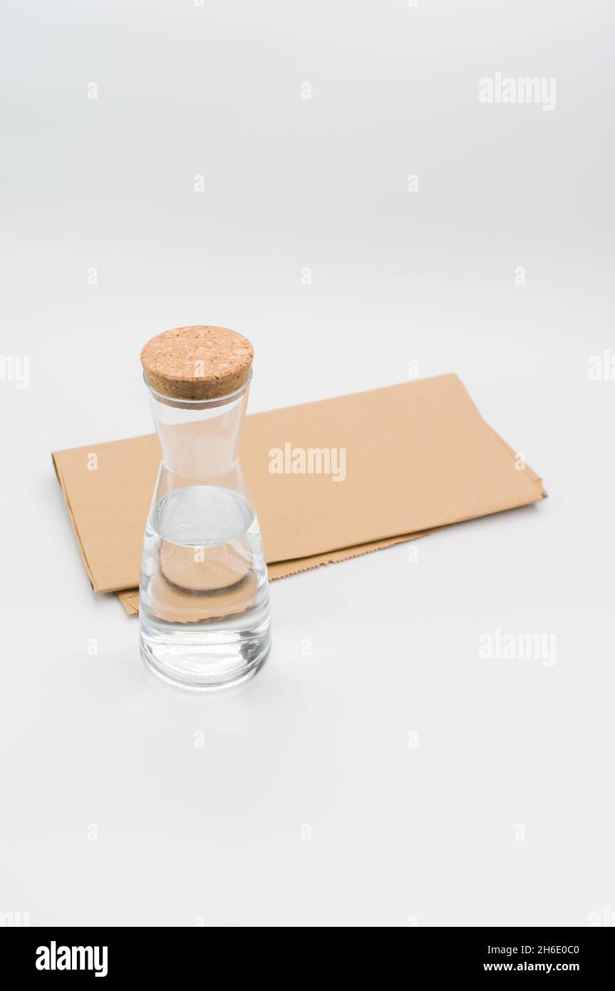 glass carafe with fresh water and cork lid on a white background Stock ...