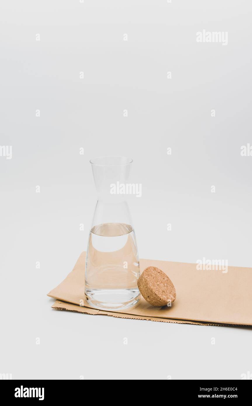 glass carafe with fresh water and cork lid on a white background Stock ...