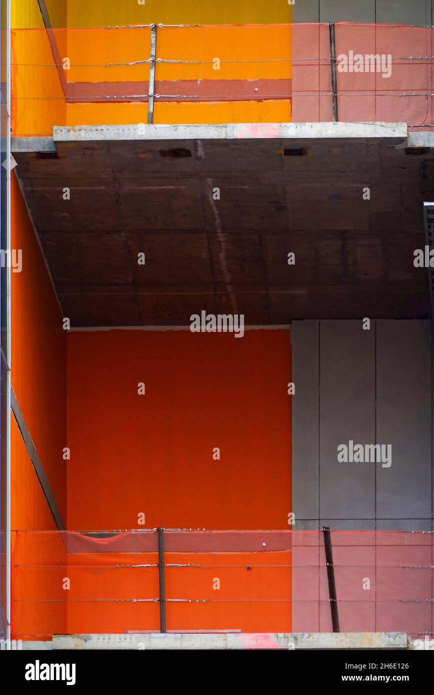 different colored walls between floors in a construction building site ...