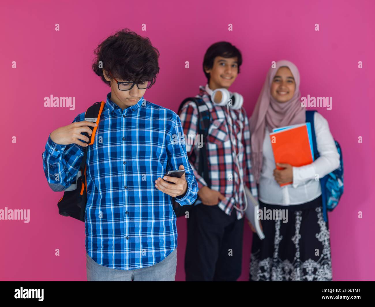 A group of Arab teenagers, a student team walking forward into the ...