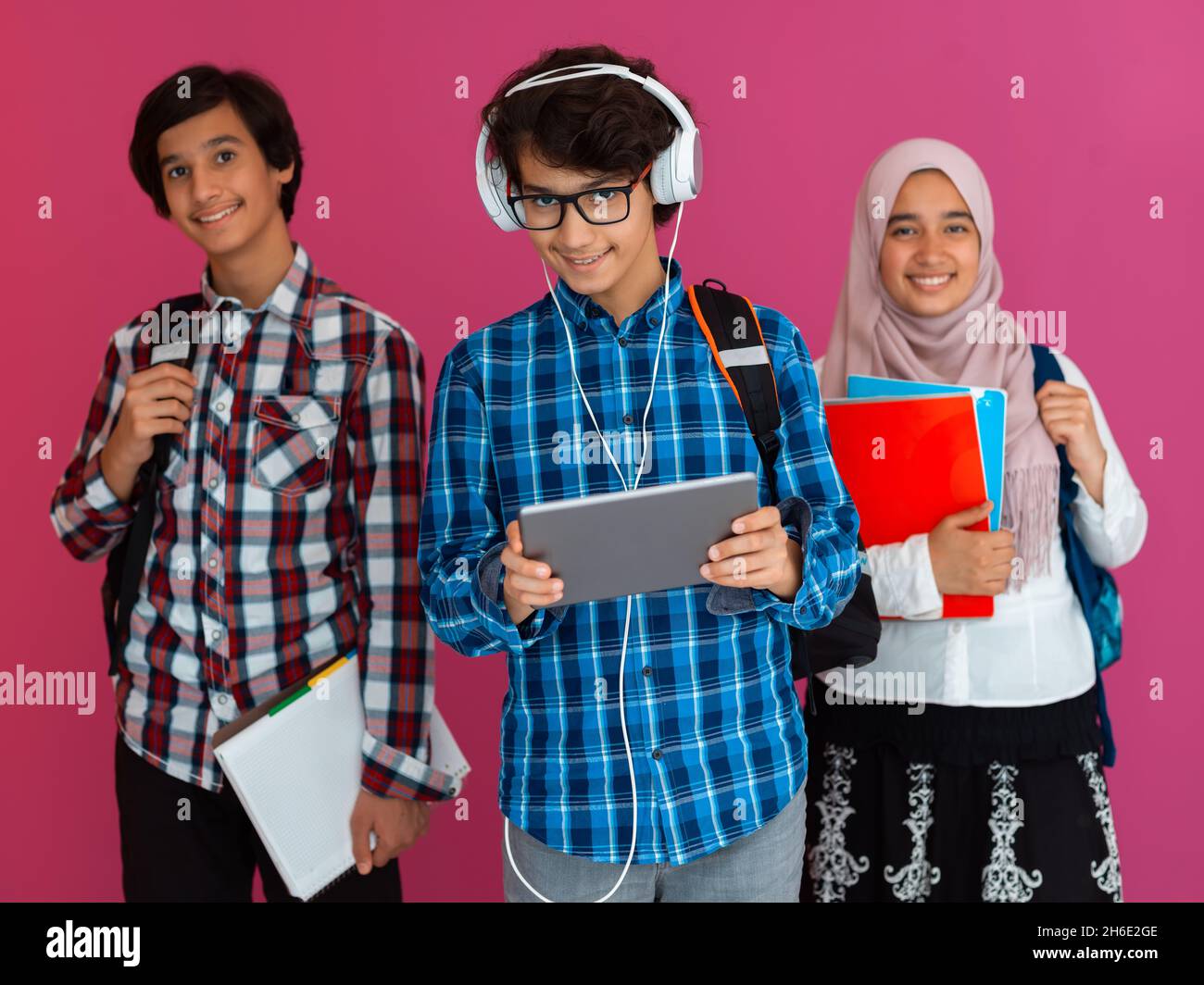 Modern arab teens use smartphone, tablet and latpop to study during ...
