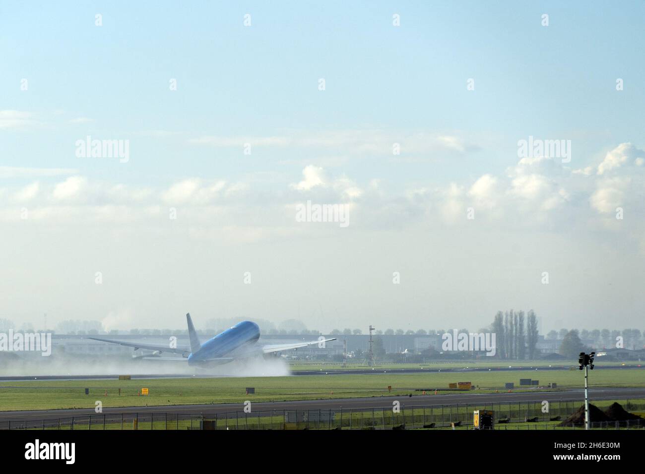 Airplane jet airport take off Stock Photo - Alamy