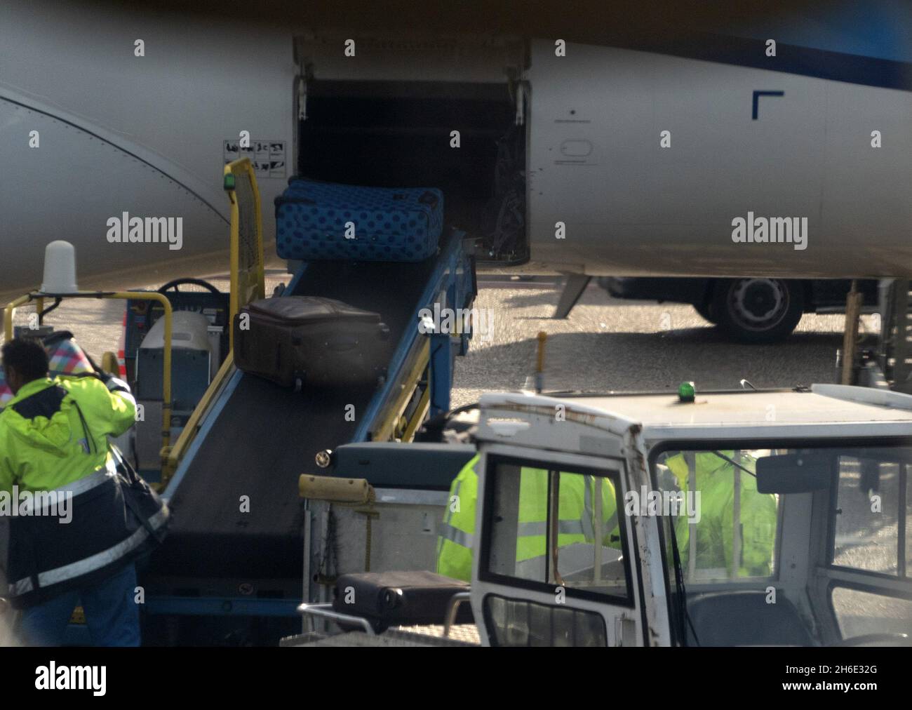 luggage loading on airplane detail Stock Photo - Alamy