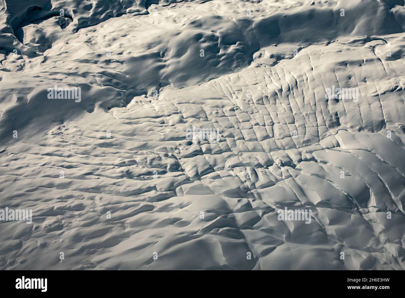 Beautiful view of a snowy mountain chain Stock Photo - Alamy