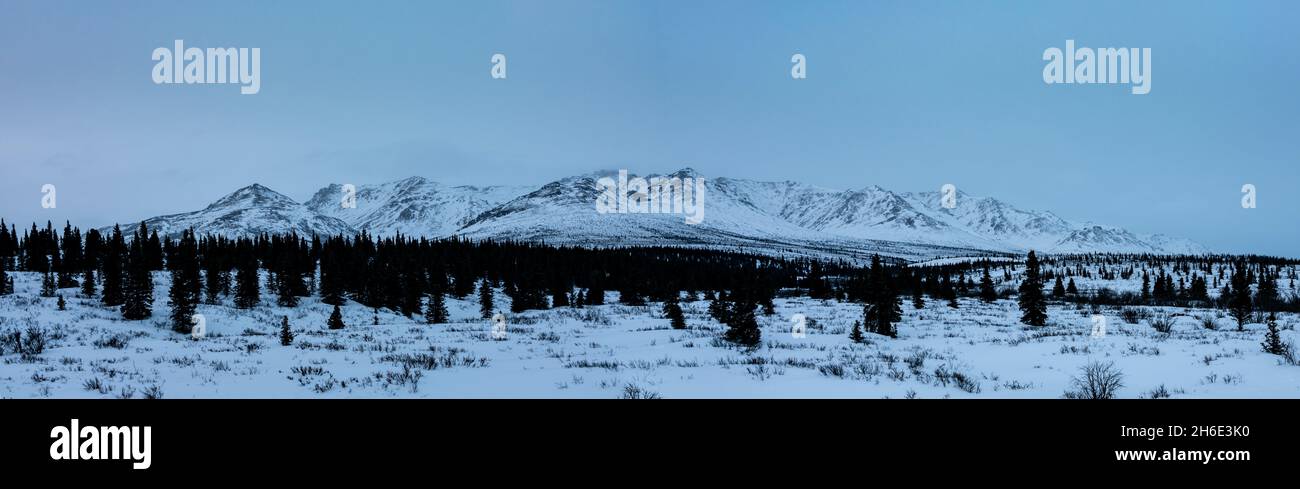 Beautiful view of a snowy mountain chain Stock Photo - Alamy