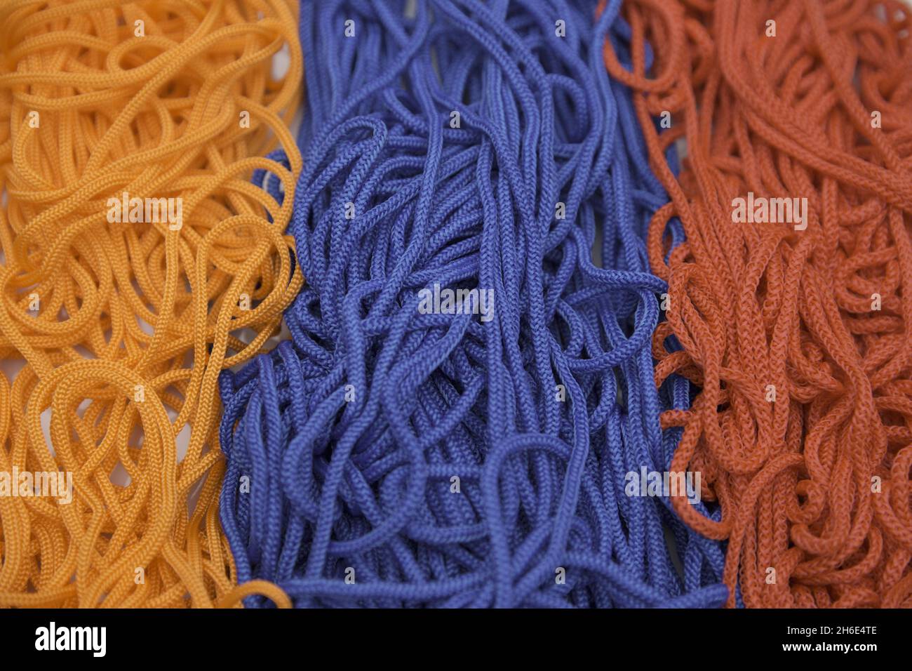 Closeup shot red threads hi-res stock photography and images - Alamy