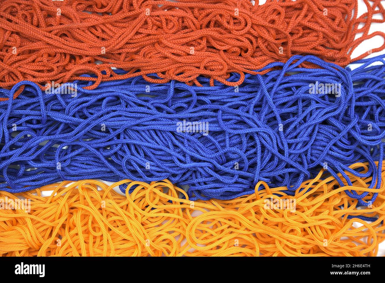 Closeup shot of soft threads in blue, red, and orange colors Stock ...