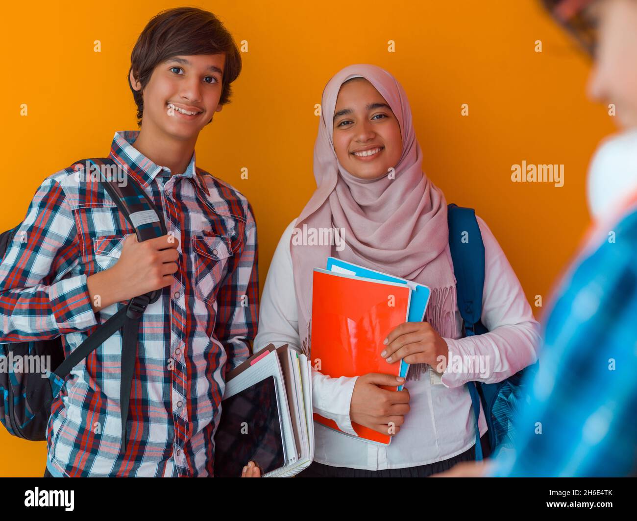 A group of Arab teenagers, a student team walking forward into the ...