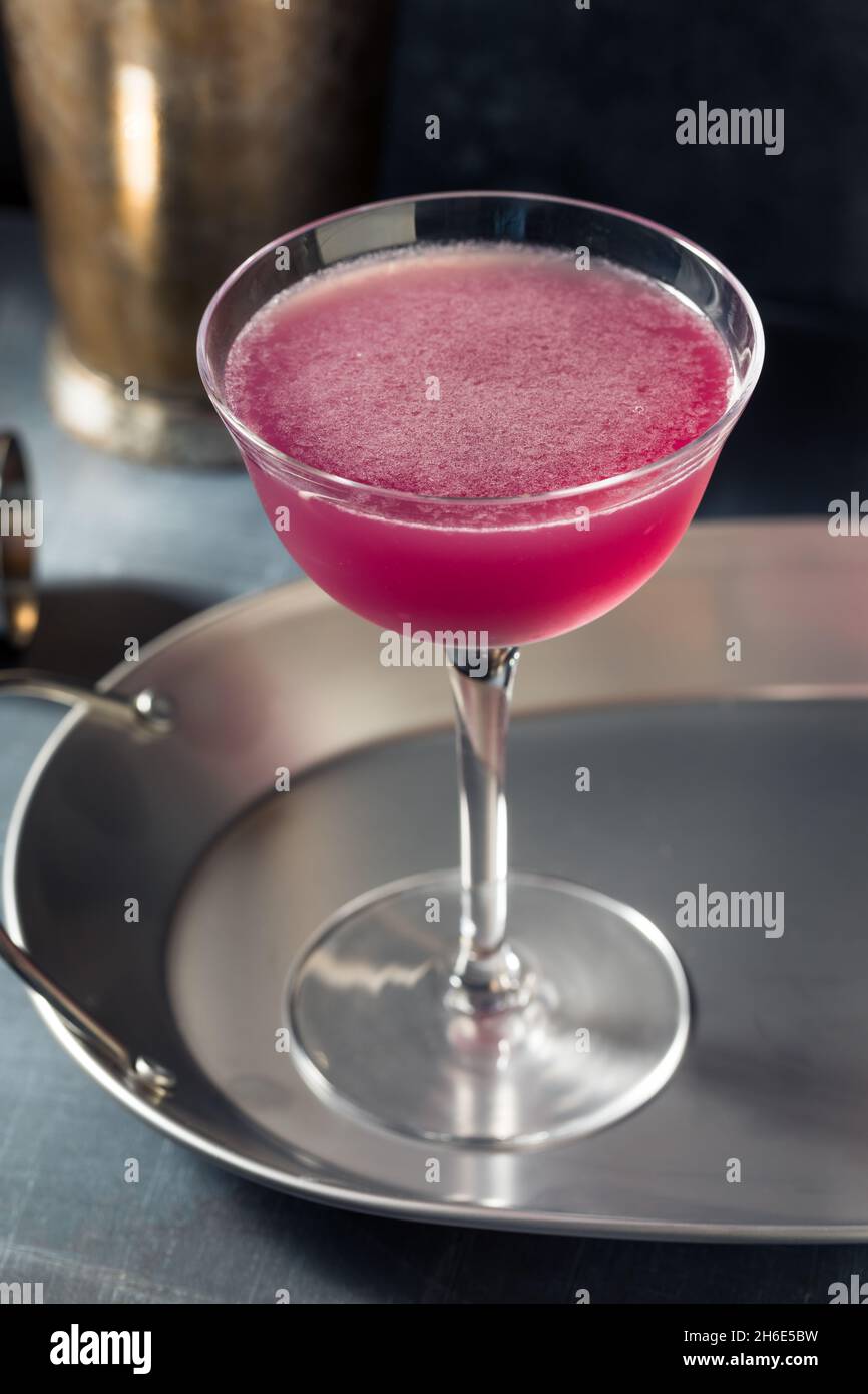 Cold Refreshing Purple Aviation Cocktail with a Cherry Garnish Stock ...