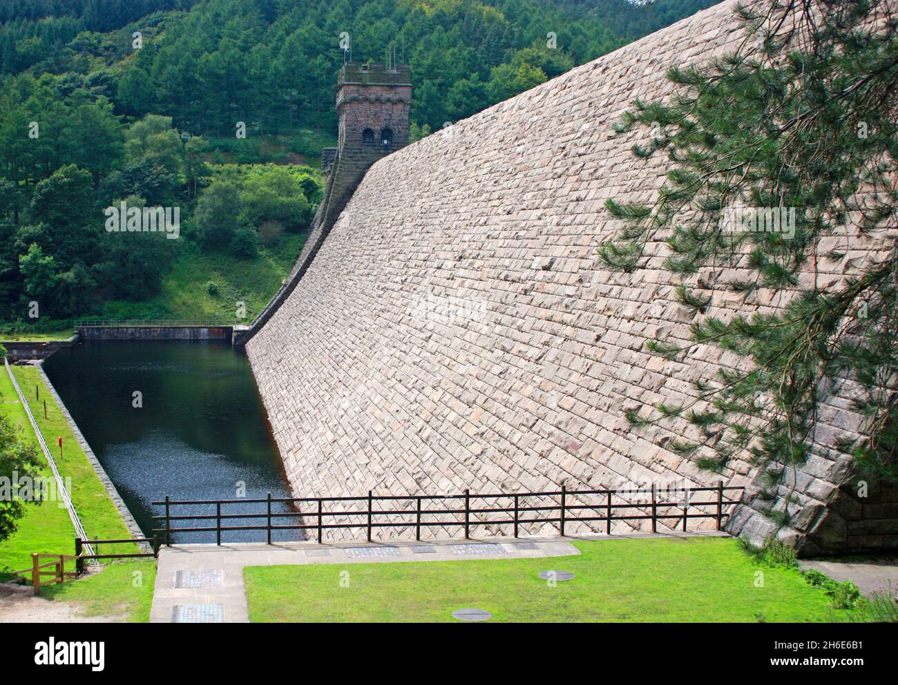 The Stone Built Wall of a Large Reservoir Dam Stock Photo - Alamy