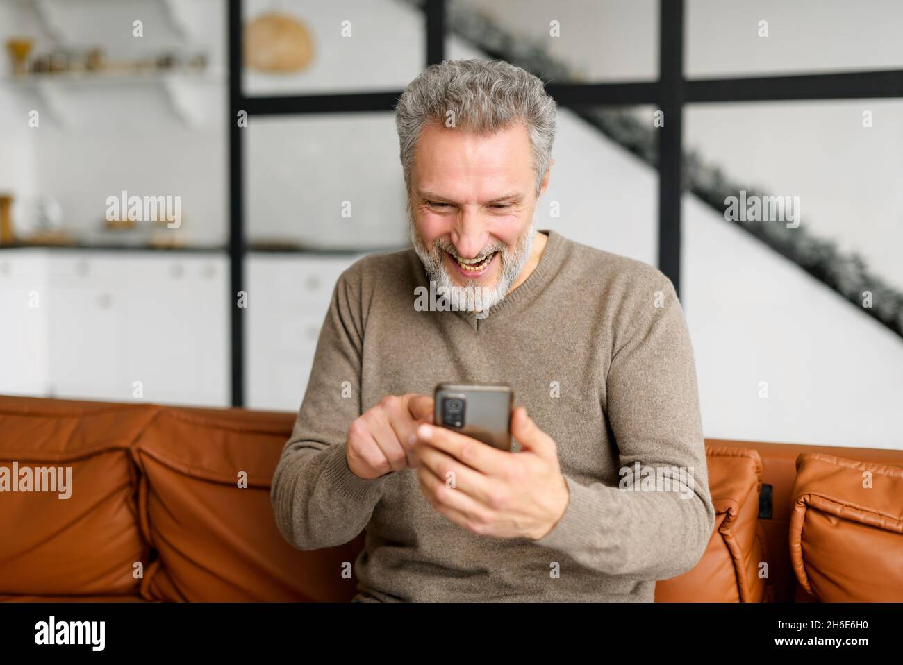 Male adult scrolling social media hi-res stock photography and images ...