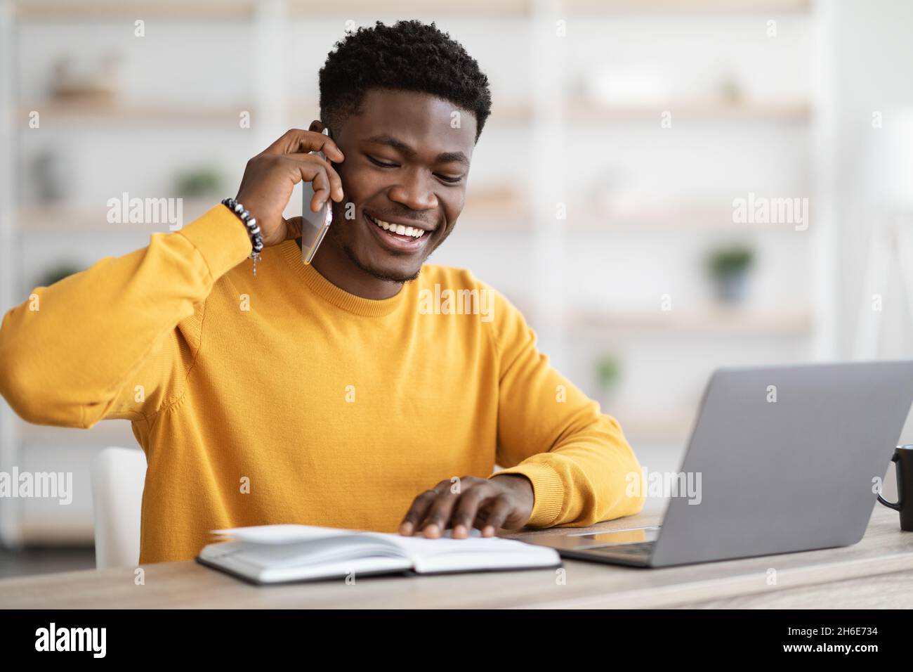 Happy unemployed black guy looking for job, talking to HR Stock Photo ...