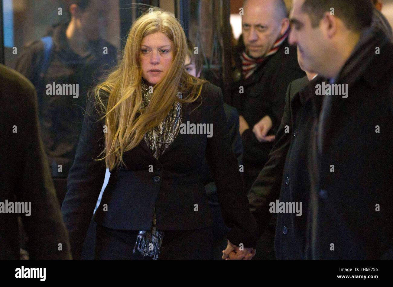 Edward Woollard's mother Tania Garwood leaves Southwark Crown Court ...