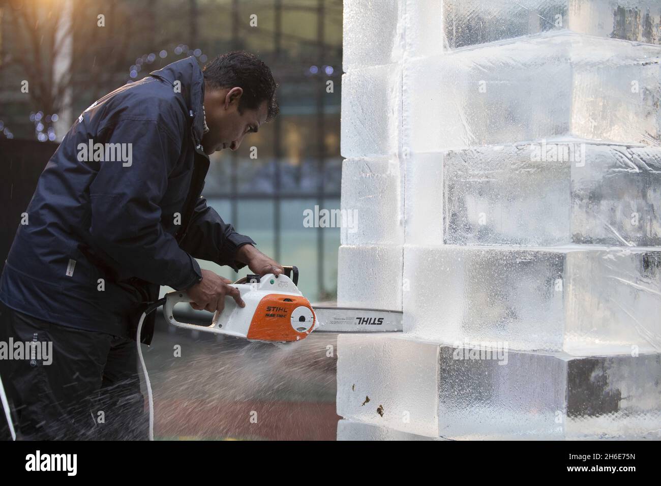 Teams of artists begin to create ice sculptures using chain saws at the ...
