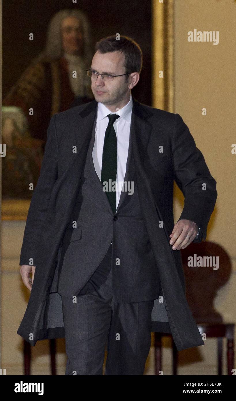 David Cameron's communications chief Andy Coulson pictured leaving ...