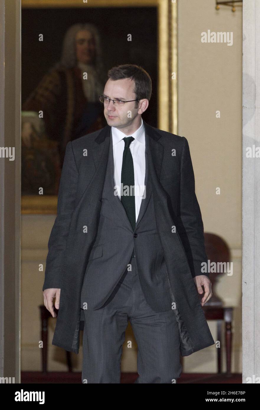 David Cameron's communications chief Andy Coulson pictured leaving ...