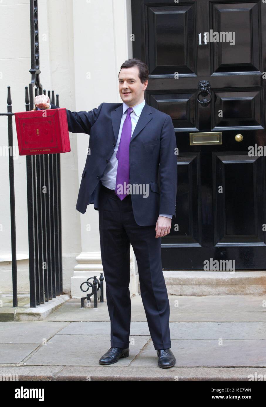 Chancellor George Osborne leaves No.11 Downing Street to announce the ...