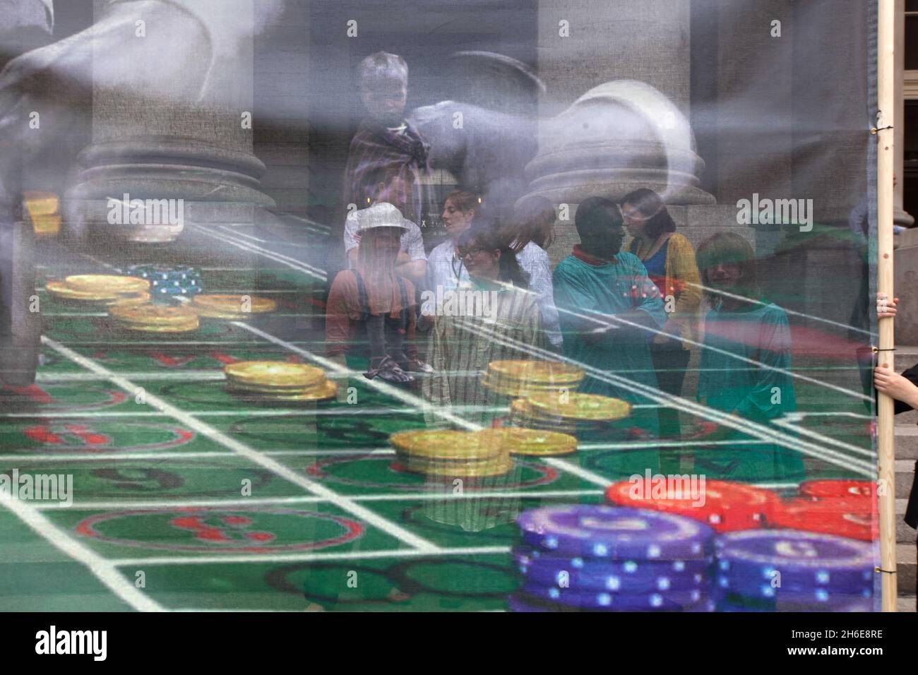 Campaigners today set up a giant roulette table in the City of London ...