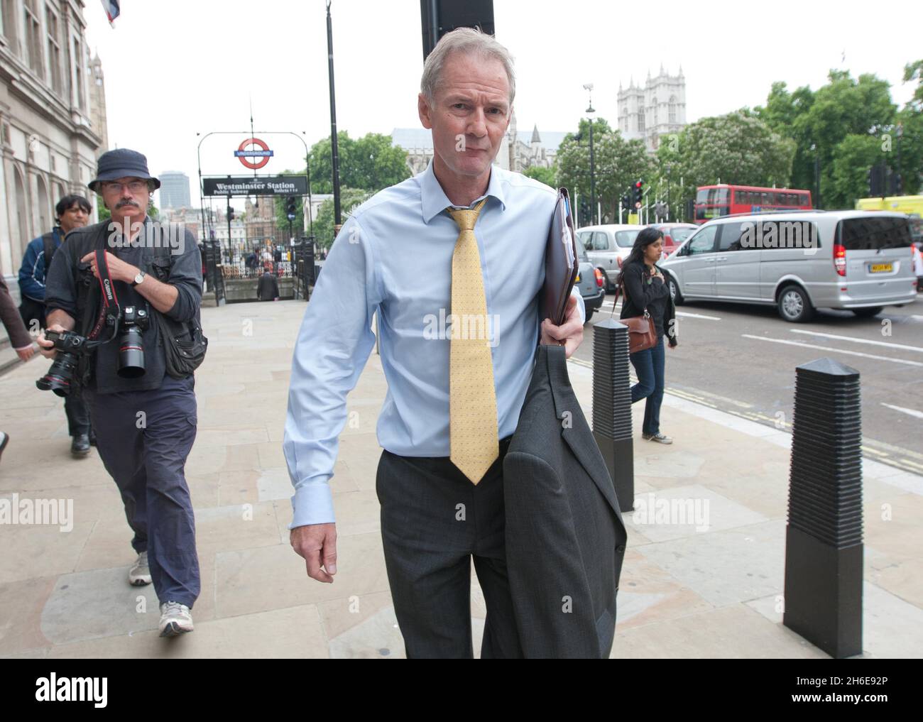 Former assistant commissioner Andy Hayman attends a hearing at ...