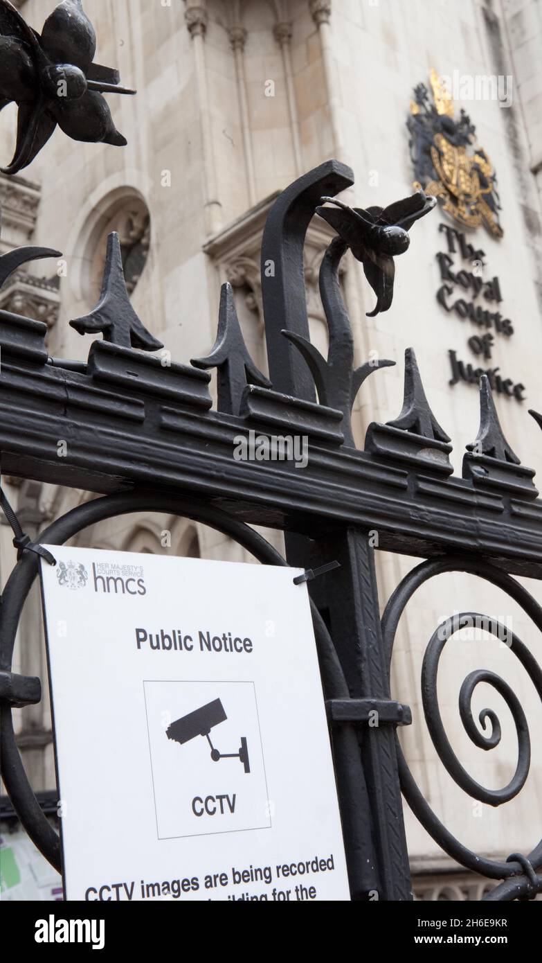 A CCTV camera sign outside the High Court in central London this ...