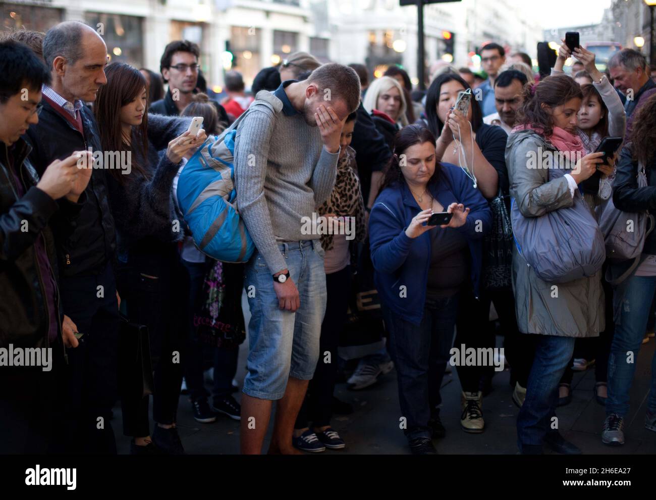 Steve Jobs dies- A man cries outside the Apple store on London's Regent ...