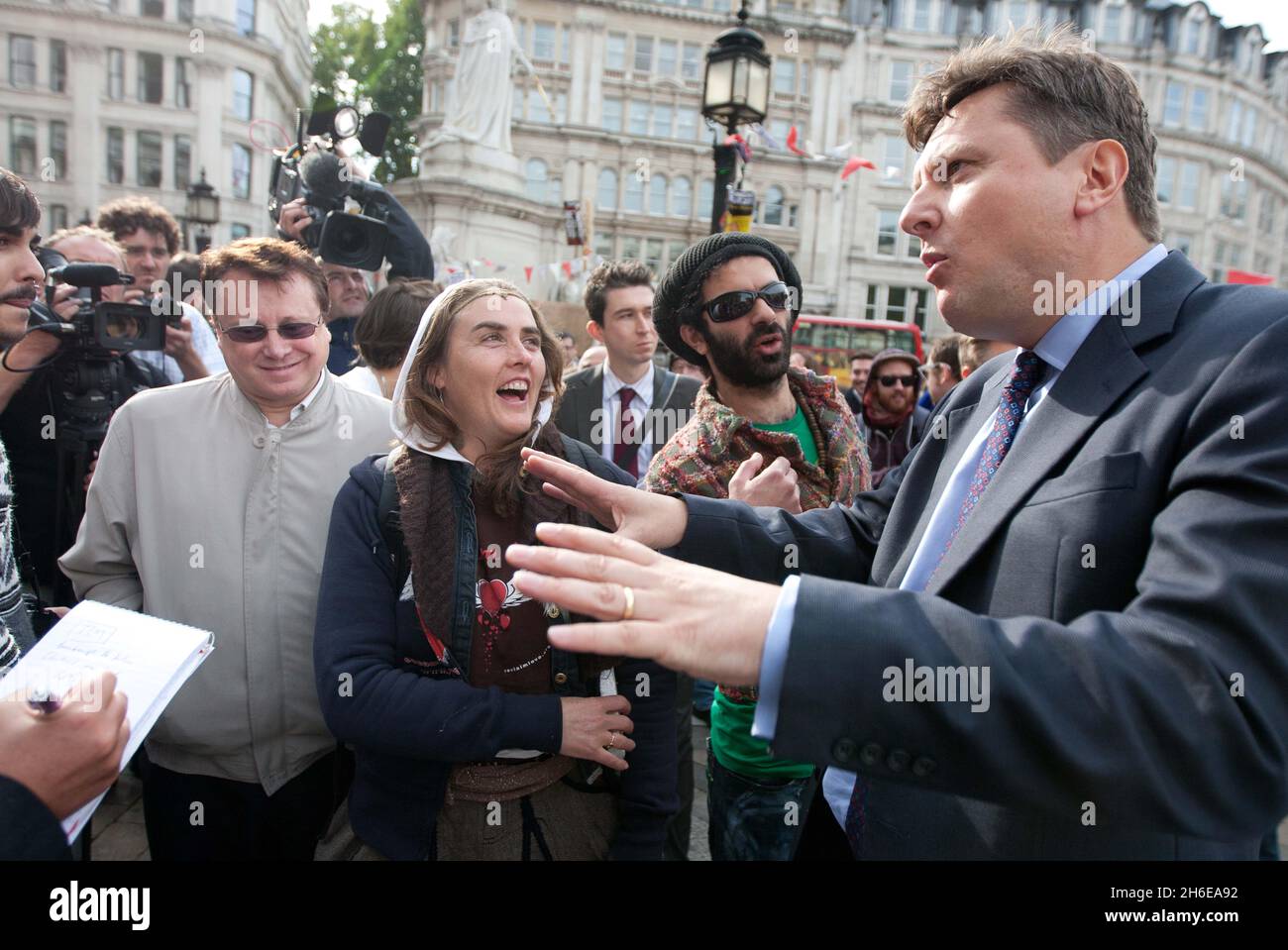 Accountant Tim Saunders shows his support as hundreds of protesters ...