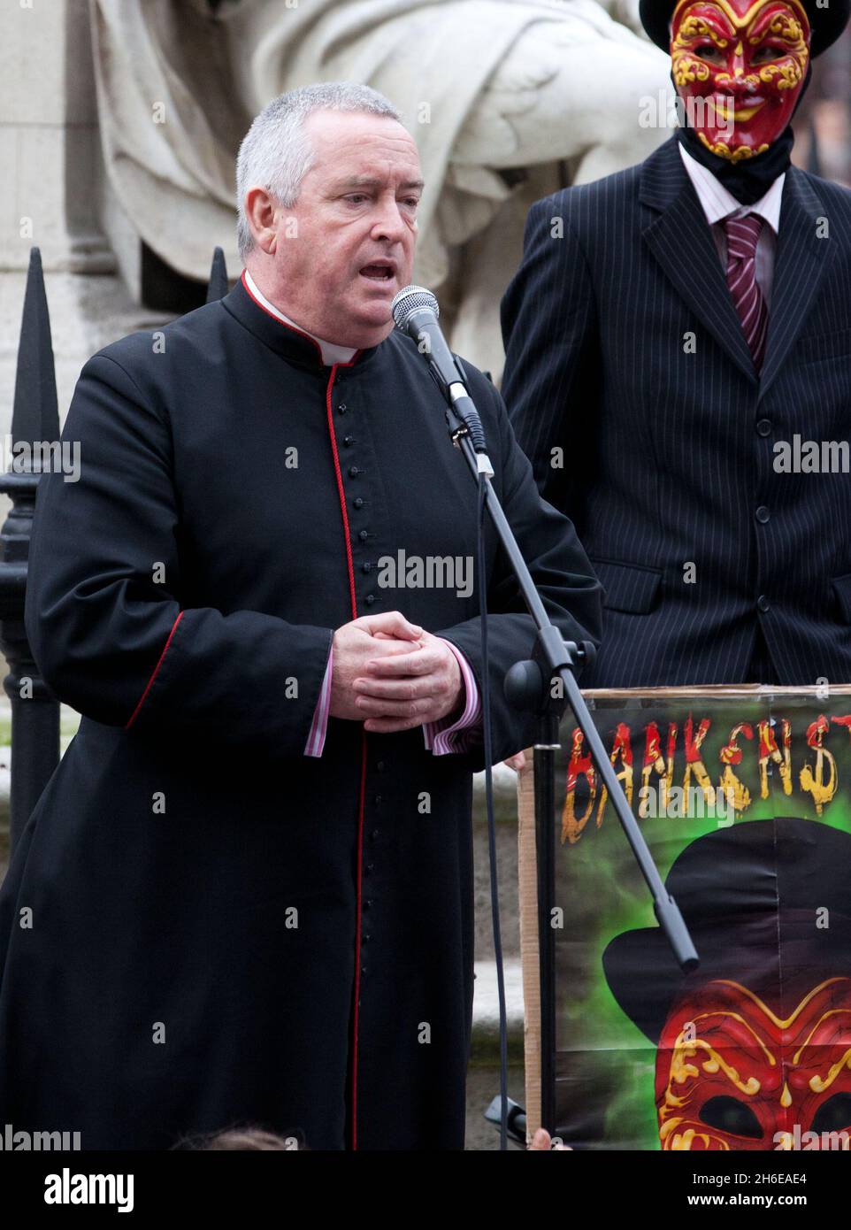 The Dean of St Paul's Graham Knowles pictured addressing protesters ...