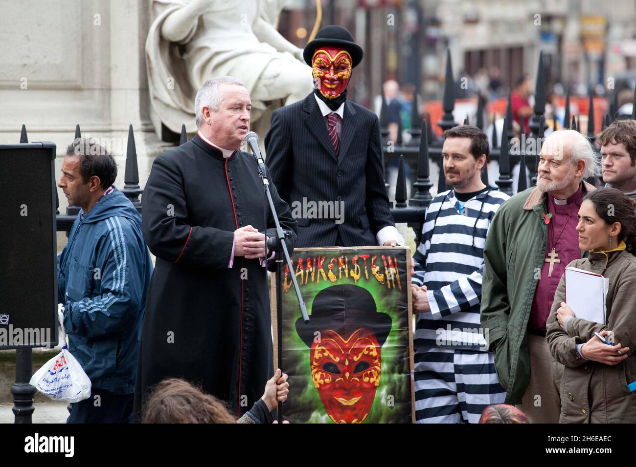 The Dean of St Paul's Graham Knowles pictured addressing protesters ...