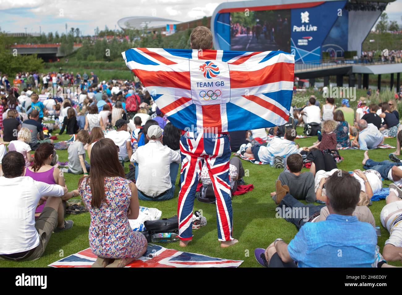 Fans watch the games in the Olympic Park in London Stock Photo - Alamy