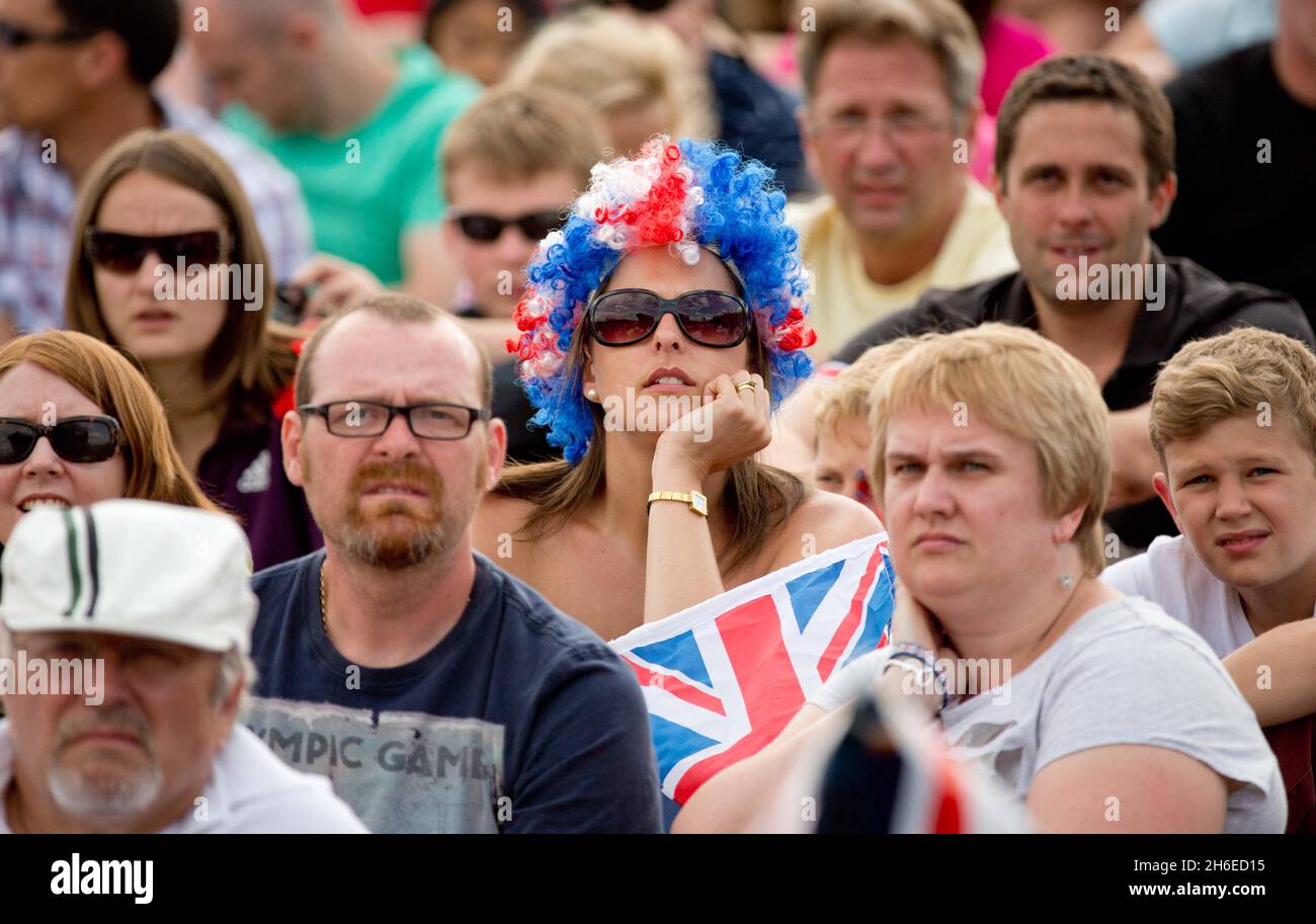 Fans watch the games in the Olympic Park in London Stock Photo - Alamy