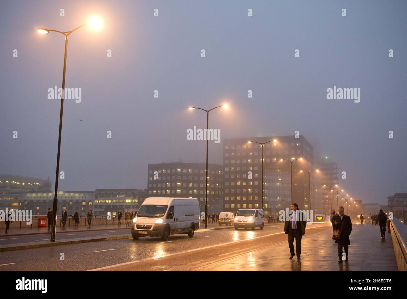 Fog covered landmarks across London this morning including the Shard ...