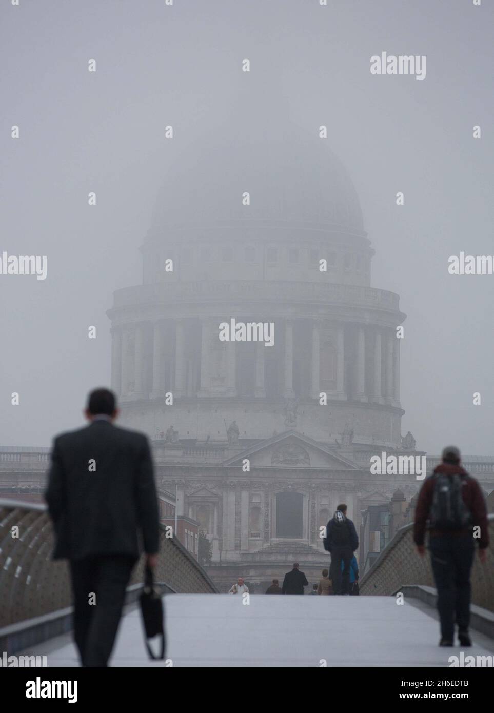 Fog covered landmarks across London this morning including the Shard ...