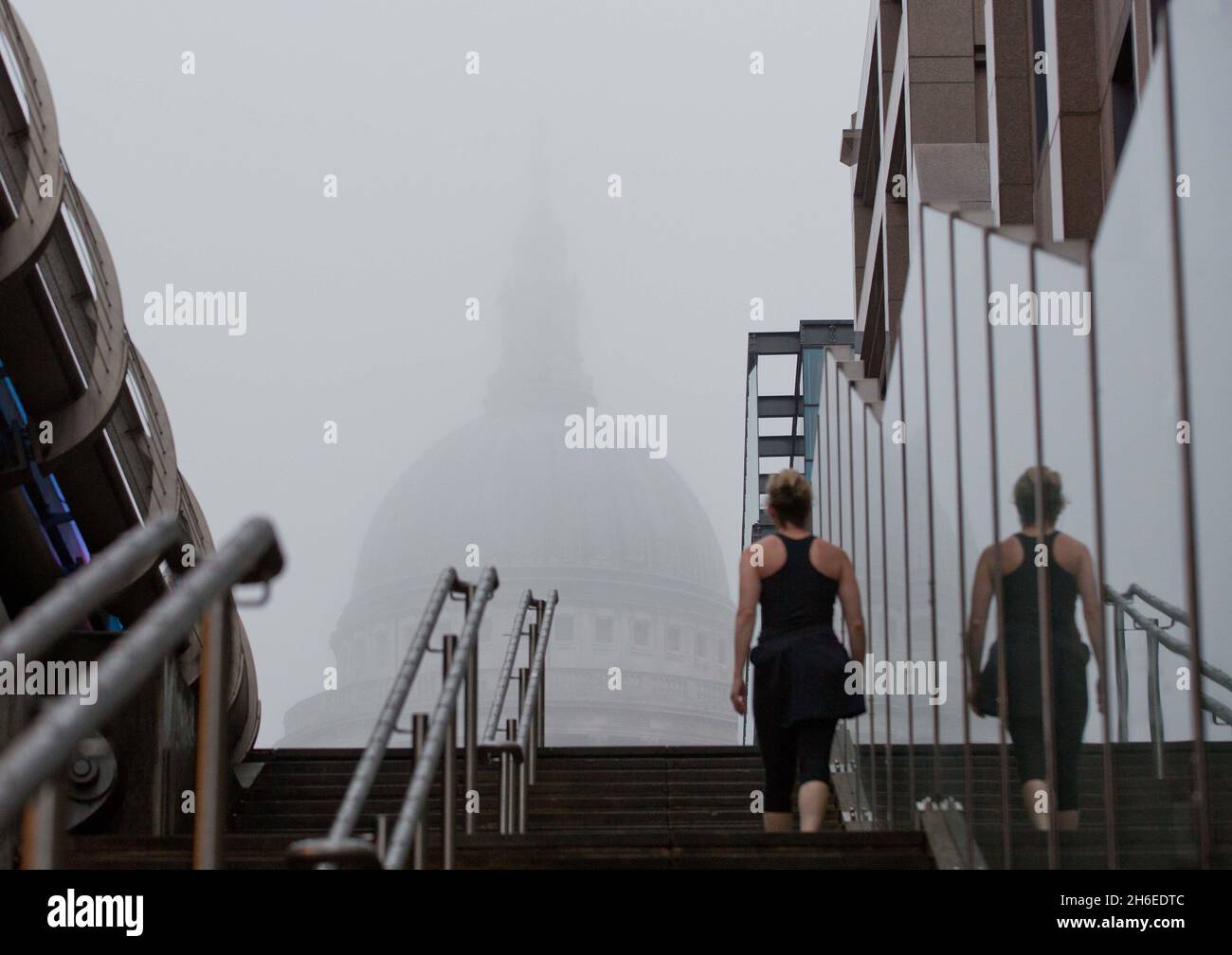 Fog covered landmarks across London this morning including the Shard ...