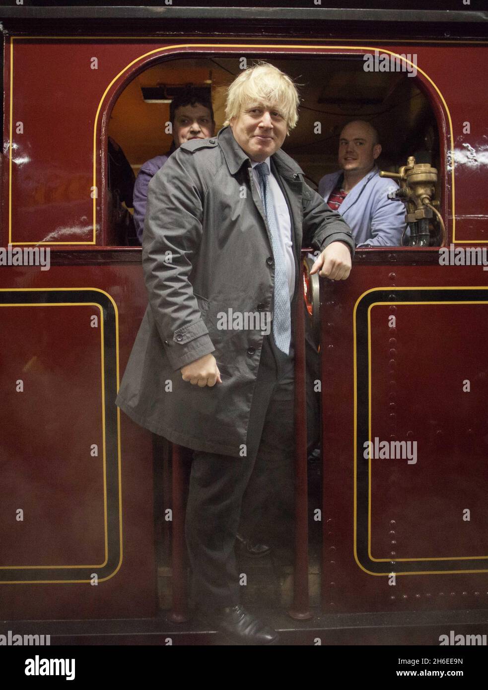 Boris Johnson rides a steam train on its journey from Moorgate station ...