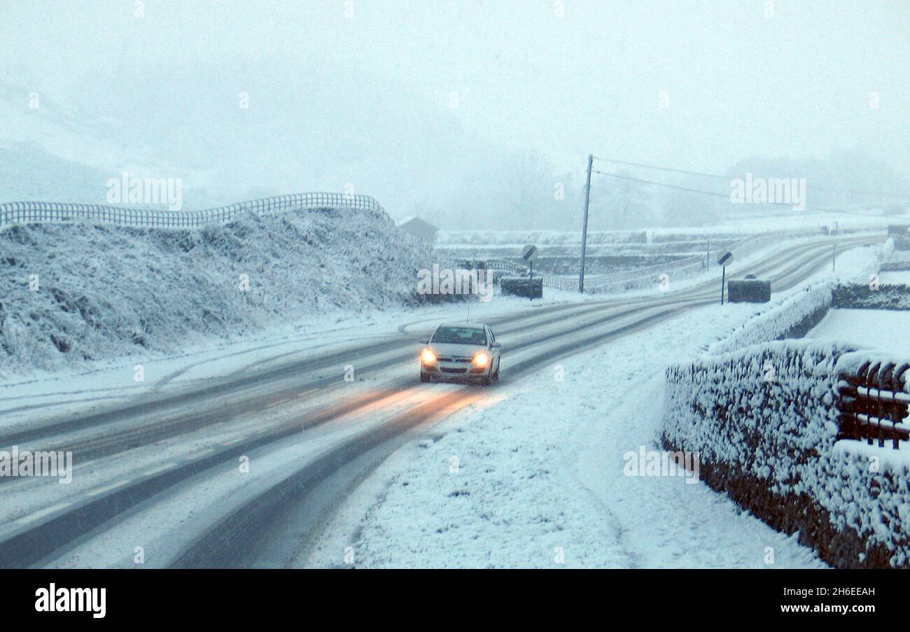 Snow on the roads and hills in Grasmere, Cumbria, this morning Stock ...