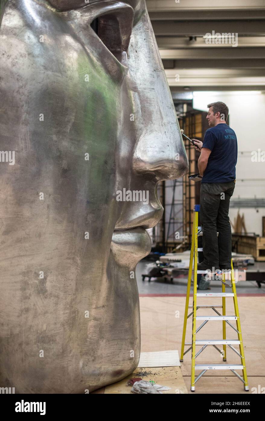 Finishes touches are made to the BAFTA stage set backstage at the Royal ...