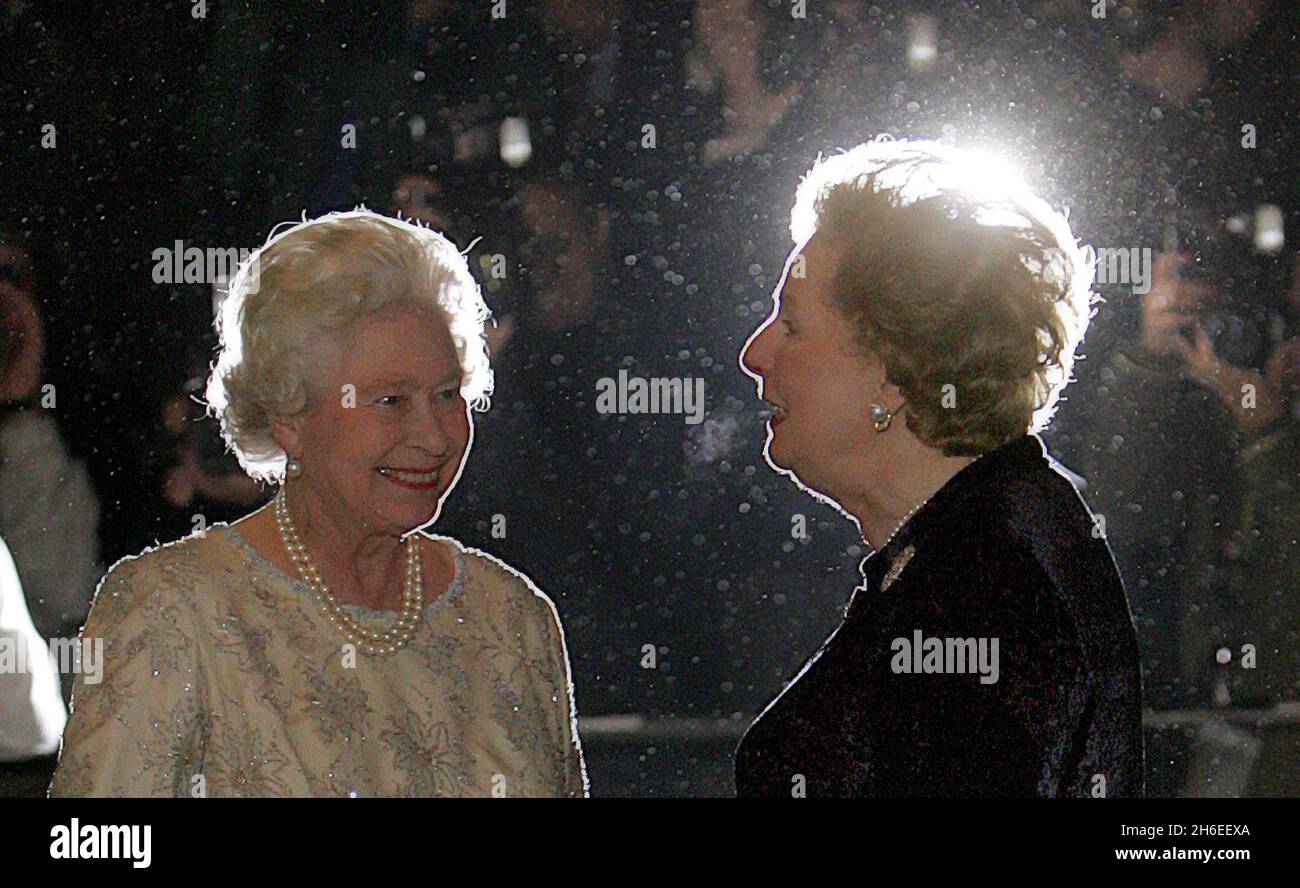 Baroness Thatcher greets the Queen at her 80th birthday party Stock ...