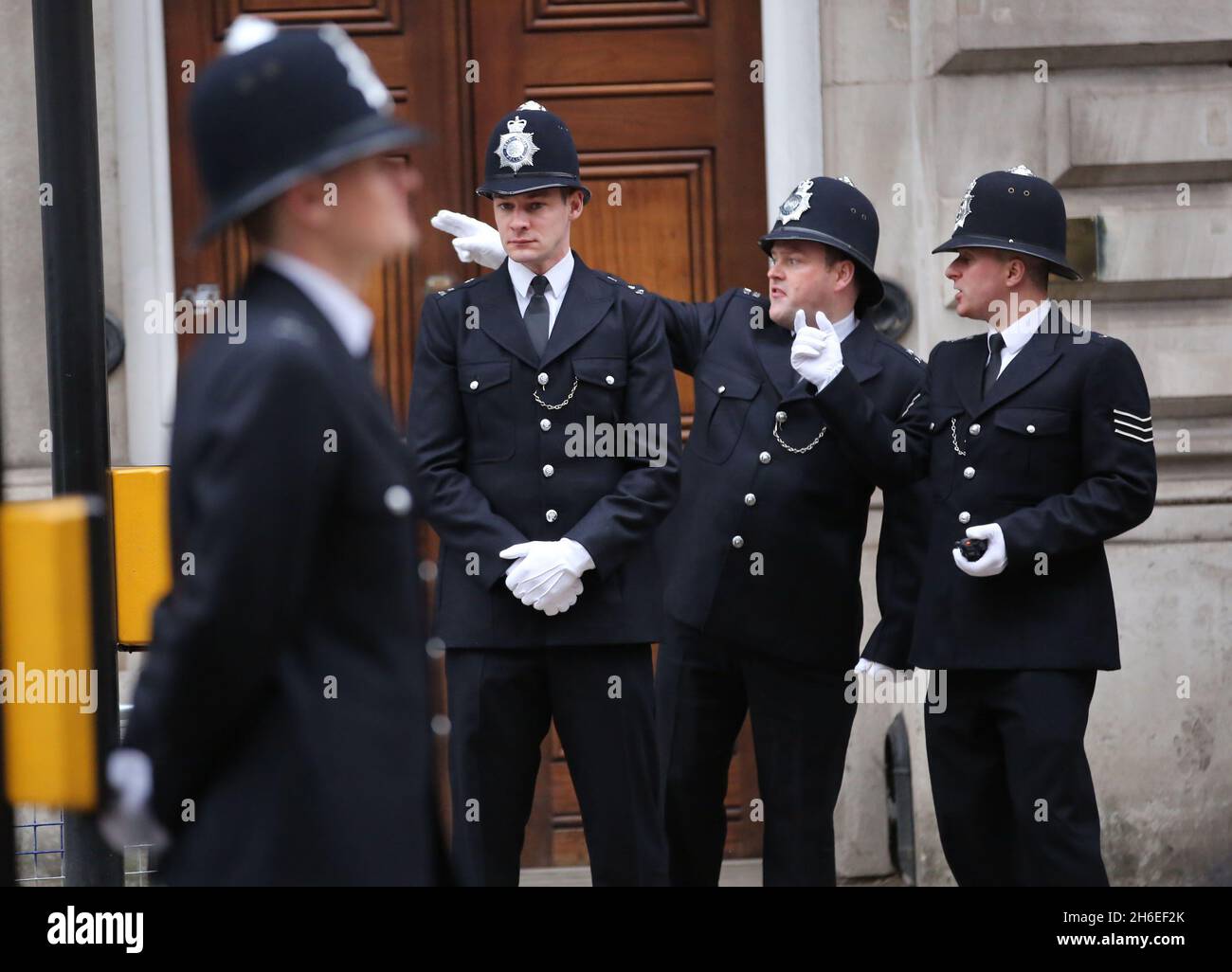 Police officers gather near St Paul's cathedral this morning for the ...