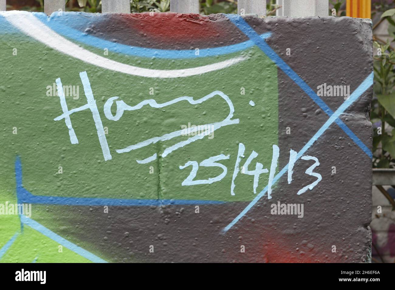 A general view of Prince Harry's signature on a spray painted wall at ...